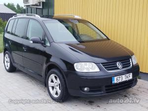 Black Volkswagen Touran 2006 in Tartu, with an engine capacity of 2.00 L and mileage of 300 thousand km for 1990 €, photo 4 on AUTOMOTO.COM.LV