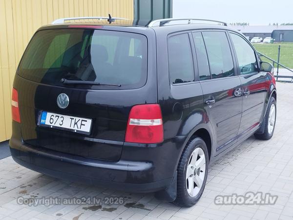 Melns Volkswagen Touran 2006 Tartu, ar dzinēja tilpumu 2.00 L un nobraukumu 300 tūkst. km par 1990 €, foto 4 vietnē AUTOMOTO.COM.LV