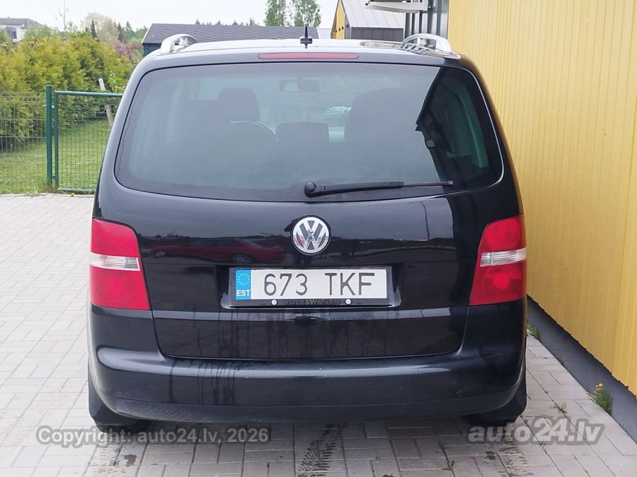 Black Volkswagen Touran 2006 in Tartu, with an engine capacity of 2.00 L and mileage of 300 thousand km for 1990 €, photo 6 on AUTOMOTO.COM.LV