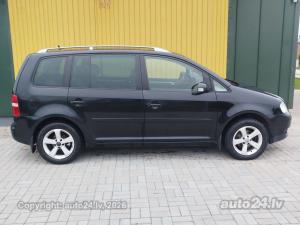 Black Volkswagen Touran 2006 in Tartu, with an engine capacity of 2.00 L and mileage of 300 thousand km for 1990 €, photo 9 on AUTOMOTO.COM.LV