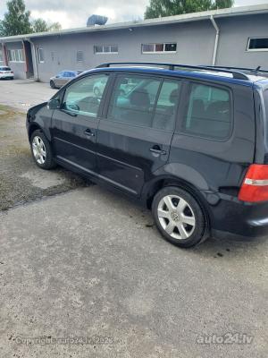 Melns Volkswagen Touran 2006 Pērnava, ar dzinēja tilpumu 2.00 L un nobraukumu 330 tūkst. km par 1970 €, foto 4 vietnē AUTOMOTO.COM.LV