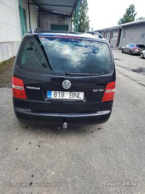 Melns Volkswagen Touran 2006 Pērnava, ar dzinēja tilpumu 2.00 L un nobraukumu 330 tūkst. km par 1970 €, foto 5 vietnē AUTOMOTO.COM.LV