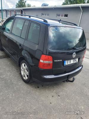 Melns Volkswagen Touran 2006 Pērnava, ar dzinēja tilpumu 2.00 L un nobraukumu 330 tūkst. km par 1970 €, foto 7 vietnē AUTOMOTO.COM.LV