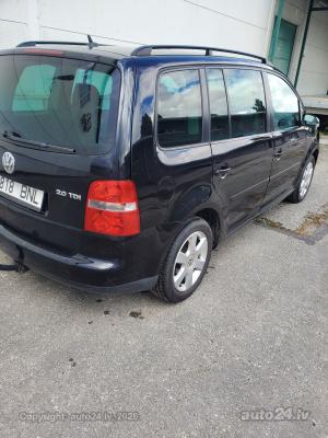 Melns Volkswagen Touran 2006 Pērnava, ar dzinēja tilpumu 2.00 L un nobraukumu 330 tūkst. km par 1970 €, foto 8 vietnē AUTOMOTO.COM.LV