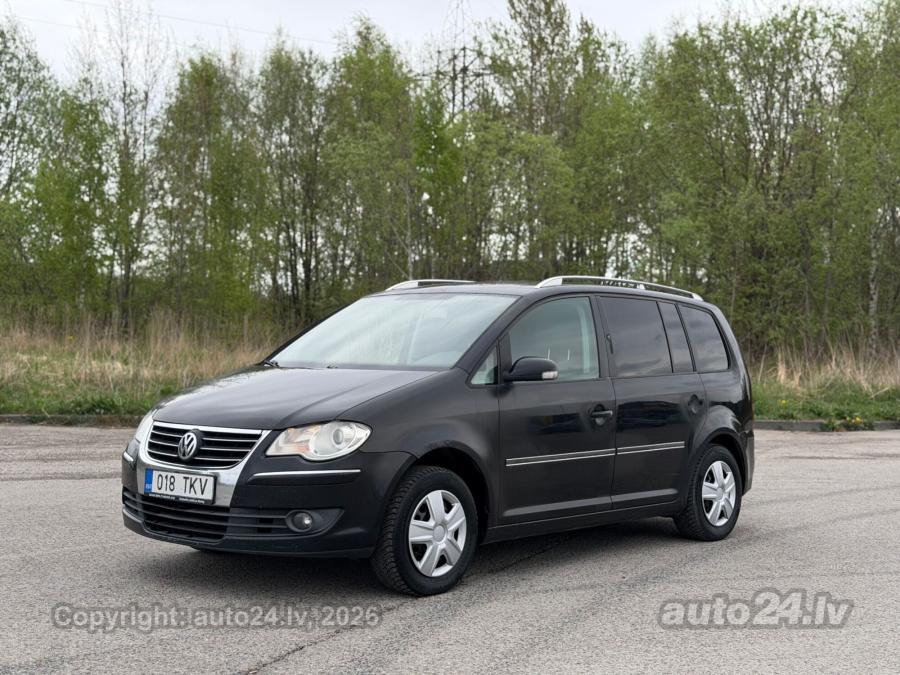 Black Volkswagen Touran 2007 in Tallinn, with an engine capacity of 2.00 L and mileage of 493 thousand km for 1000 €, photo 1 on AUTOMOTO.COM.LV