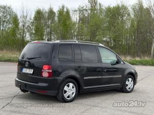 Black Volkswagen Touran 2007 in Tallinn, with an engine capacity of 2.00 L and mileage of 493 thousand km for 1000 €, photo 5 on AUTOMOTO.COM.LV