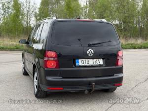 Black Volkswagen Touran 2007 in Tallinn, with an engine capacity of 2.00 L and mileage of 493 thousand km for 1000 €, photo 6 on AUTOMOTO.COM.LV