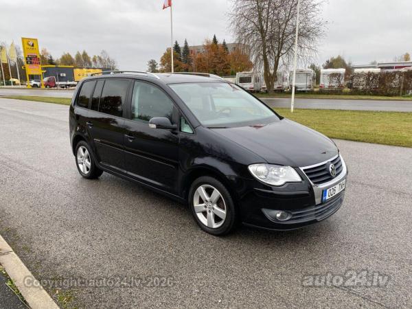 Black Volkswagen Touran 2008 in Tartu, with an engine capacity of 1.40 L and mileage of 195 thousand km for 4800 €, photo 2 on AUTOMOTO.COM.LV