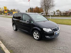 Black Volkswagen Touran 2008 in Tartu, with an engine capacity of 1.40 L and mileage of 195 thousand km for 4800 €, photo 2 on AUTOMOTO.COM.LV