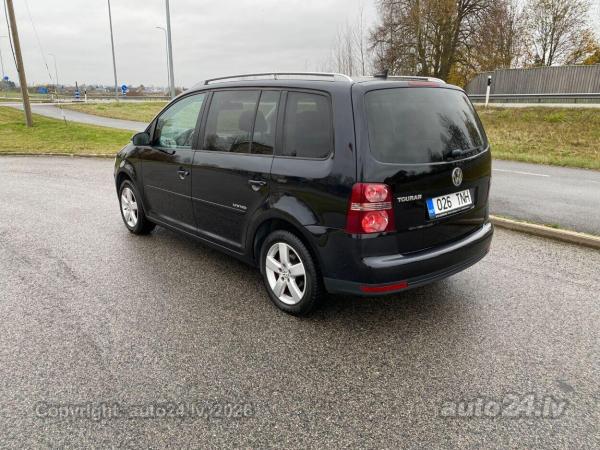 Black Volkswagen Touran 2008 in Tartu, with an engine capacity of 1.40 L and mileage of 195 thousand km for 4800 €, photo 4 on AUTOMOTO.COM.LV