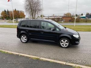 Black Volkswagen Touran 2008 in Tartu, with an engine capacity of 1.40 L and mileage of 195 thousand km for 4800 €, photo 6 on AUTOMOTO.COM.LV