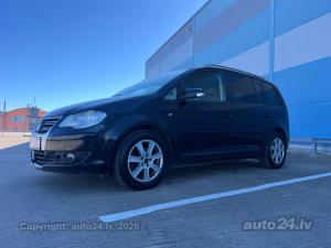Black Volkswagen Touran 2008 in Narva, with an engine capacity of 1.40 L and mileage of 245 thousand km for 1499 €, photo  on AUTOMOTO.COM.LV