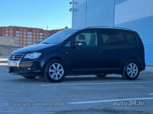 Black Volkswagen Touran 2008 in Narva, with an engine capacity of 1.40 L and mileage of 245 thousand km for 1499 €, photo 4 on AUTOMOTO.COM.LV