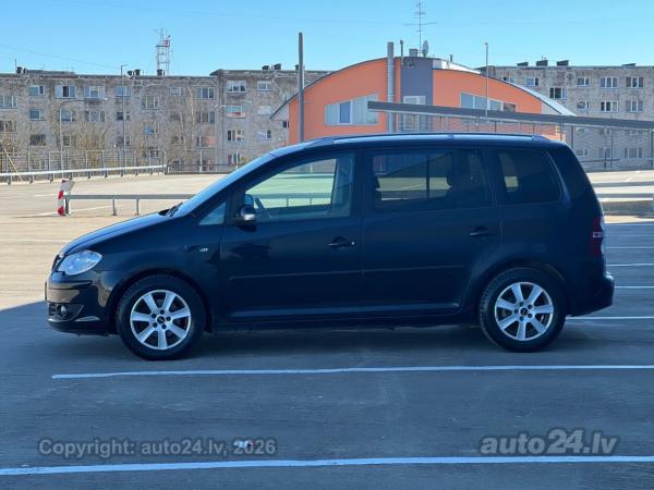 Black Volkswagen Touran 2008 in Narva, with an engine capacity of 1.40 L and mileage of 245 thousand km for 1499 €, photo 6 on AUTOMOTO.COM.LV
