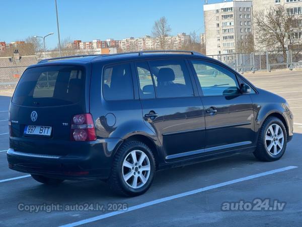 Black Volkswagen Touran 2008 in Narva, with an engine capacity of 1.40 L and mileage of 245 thousand km for 1499 €, photo 9 on AUTOMOTO.COM.LV