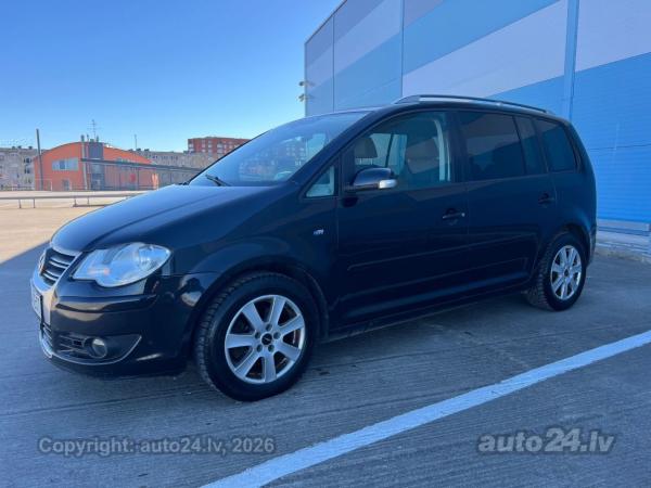 Black Volkswagen Touran 2008 in Narva, with an engine capacity of 1.40 L and mileage of 245 thousand km for 1499 €, photo 10 on AUTOMOTO.COM.LV