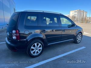Black Volkswagen Touran 2008 in Narva, with an engine capacity of 1.40 L and mileage of 245 thousand km for 1499 €, photo 14 on AUTOMOTO.COM.LV