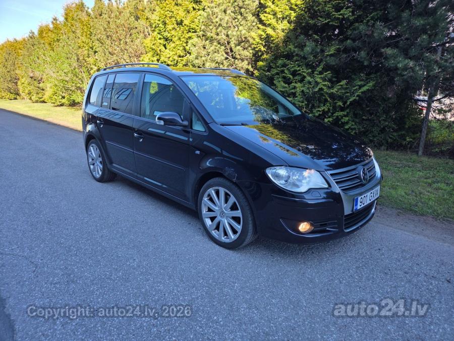 Melns Volkswagen Touran 2008 Tallina, ar dzinēja tilpumu 1.40 L un nobraukumu 275 tūkst. km par 4444 €, foto 1 vietnē AUTOMOTO.COM.LV