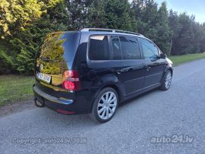 Melns Volkswagen Touran 2008 Tallina, ar dzinēja tilpumu 1.40 L un nobraukumu 275 tūkst. km par 4444 €, foto 3 vietnē AUTOMOTO.COM.LV