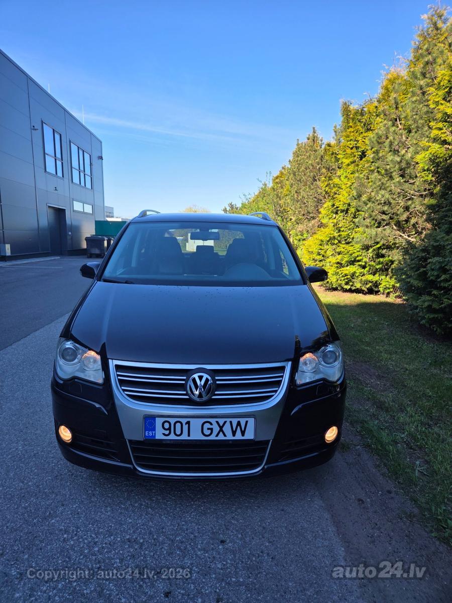 Melns Volkswagen Touran 2008 Tallina, ar dzinēja tilpumu 1.40 L un nobraukumu 275 tūkst. km par 4444 €, foto 7 vietnē AUTOMOTO.COM.LV