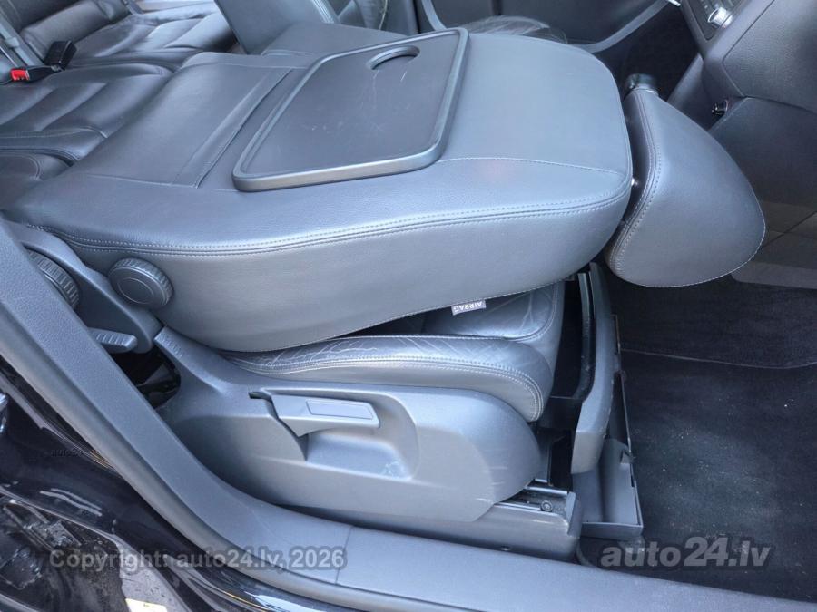 Melns Volkswagen Touran 2008 Tallina, ar dzinēja tilpumu 1.40 L un nobraukumu 275 tūkst. km par 4444 €, foto 16 vietnē AUTOMOTO.COM.LV