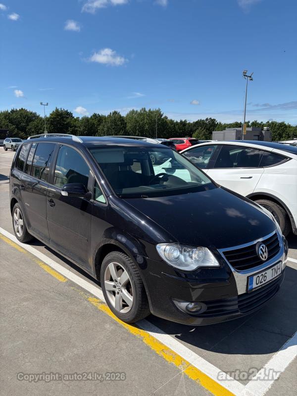 Melns Volkswagen Touran 2008 Tallina, ar dzinēja tilpumu 1.40 L un nobraukumu 207 tūkst. km par 4500 €, foto 1 vietnē AUTOMOTO.COM.LV