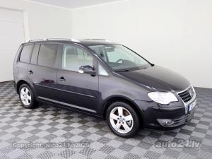 Black Volkswagen Touran 2008 in Tallinn, with an engine capacity of 1.40 L and mileage of 211 thousand km for 2699 €, photo  on AUTOMOTO.COM.LV