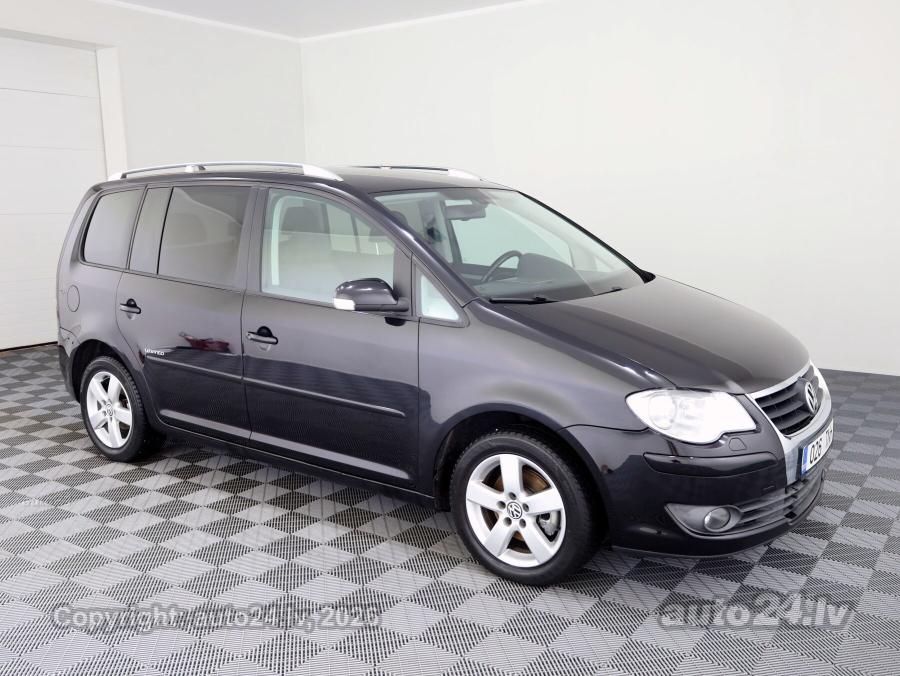 Black Volkswagen Touran 2008 in Tallinn, with an engine capacity of 1.40 L and mileage of 211 thousand km for 2699 €, photo 1 on AUTOMOTO.COM.LV