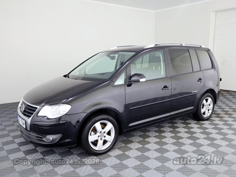 Black Volkswagen Touran 2008 in Tallinn, with an engine capacity of 1.40 L and mileage of 211 thousand km for 2699 €, photo 3 on AUTOMOTO.COM.LV