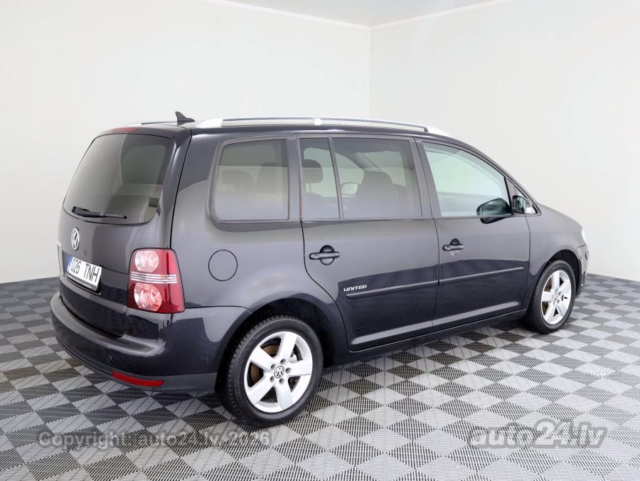 Black Volkswagen Touran 2008 in Tallinn, with an engine capacity of 1.40 L and mileage of 211 thousand km for 2699 €, photo 4 on AUTOMOTO.COM.LV