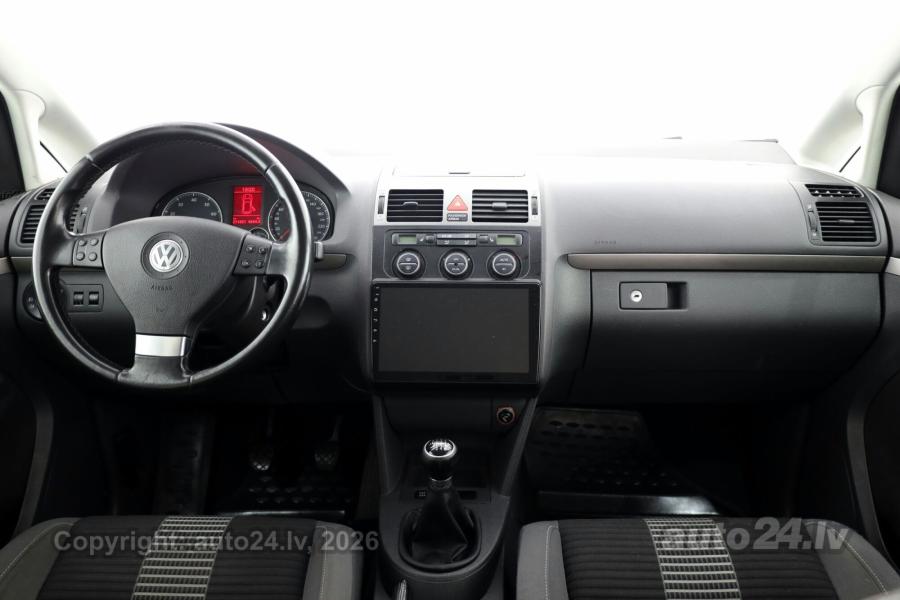 Black Volkswagen Touran 2008 in Tallinn, with an engine capacity of 1.40 L and mileage of 211 thousand km for 2699 €, photo 6 on AUTOMOTO.COM.LV