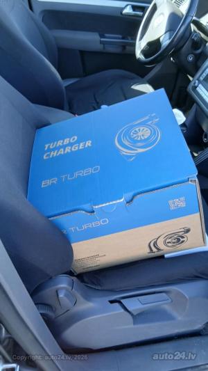 Melns Volkswagen Touran 2008 Tallina, ar dzinēja tilpumu 2.00 L un nobraukumu 387 tūkst. km par 2700 €, foto 16 vietnē AUTOMOTO.COM.LV