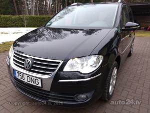 Black Volkswagen Touran 2009 in Tallinn, with an engine capacity of 2.00 L and mileage of 282 thousand km for 5590 €, photo  on AUTOMOTO.COM.LV