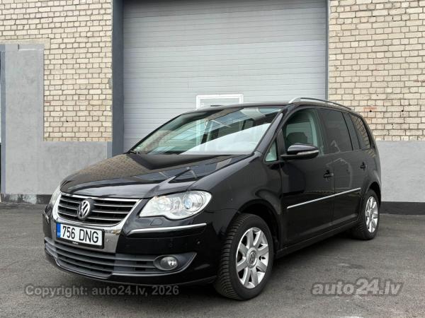 Melns Volkswagen Touran 2009 Paide, ar dzinēja tilpumu 2.00 L un nobraukumu 282 tūkst. km par 5790 €, foto 1 vietnē AUTOMOTO.COM.LV