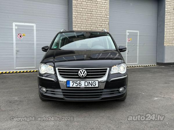 Melns Volkswagen Touran 2009 Paide, ar dzinēja tilpumu 2.00 L un nobraukumu 282 tūkst. km par 5790 €, foto 2 vietnē AUTOMOTO.COM.LV