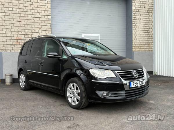 Melns Volkswagen Touran 2009 Paide, ar dzinēja tilpumu 2.00 L un nobraukumu 282 tūkst. km par 5790 €, foto 3 vietnē AUTOMOTO.COM.LV