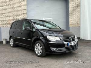 Melns Volkswagen Touran 2009 Paide, ar dzinēja tilpumu 2.00 L un nobraukumu 282 tūkst. km par 5790 €, foto 4 vietnē AUTOMOTO.COM.LV