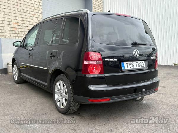 Melns Volkswagen Touran 2009 Paide, ar dzinēja tilpumu 2.00 L un nobraukumu 282 tūkst. km par 5790 €, foto 8 vietnē AUTOMOTO.COM.LV