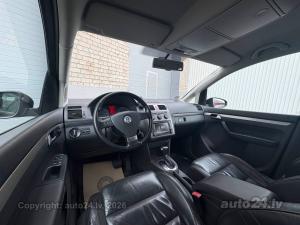 Melns Volkswagen Touran 2009 Paide, ar dzinēja tilpumu 2.00 L un nobraukumu 282 tūkst. km par 5790 €, foto 10 vietnē AUTOMOTO.COM.LV