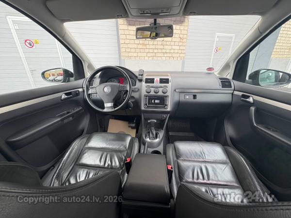 Melns Volkswagen Touran 2009 Paide, ar dzinēja tilpumu 2.00 L un nobraukumu 282 tūkst. km par 5790 €, foto 10 vietnē AUTOMOTO.COM.LV