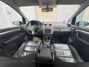 Melns Volkswagen Touran 2009 Paide, ar dzinēja tilpumu 2.00 L un nobraukumu 282 tūkst. km par 5790 €, foto 11 vietnē AUTOMOTO.COM.LV