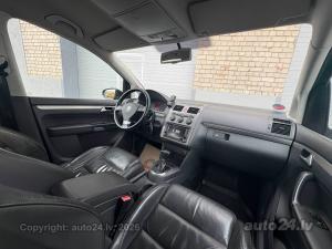 Melns Volkswagen Touran 2009 Paide, ar dzinēja tilpumu 2.00 L un nobraukumu 282 tūkst. km par 5790 €, foto 12 vietnē AUTOMOTO.COM.LV