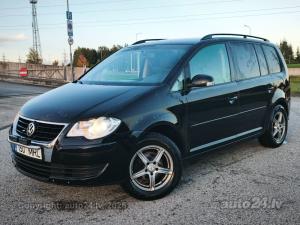 Черный Фольксваген Туран 2009 в Тарту, объемом двигателя 1.90 л и пробегом 273 тыс. км за 1999 €, фото  на AUTOMOTO.COM.LV