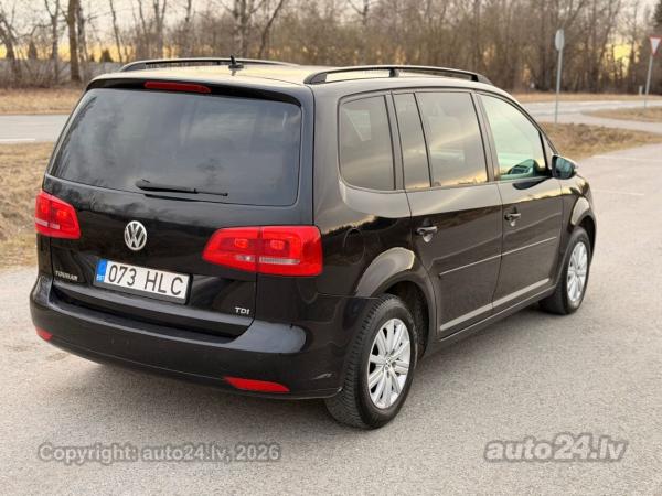 Melns Volkswagen Touran 2011 Tartu, ar dzinēja tilpumu 1.60 L un nobraukumu 336 tūkst. km par 4399 €, foto 4 vietnē AUTOMOTO.COM.LV