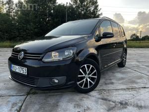 Melns Volkswagen Touran 2011 Cēsis, ar dzinēja tilpumu 1.60 L un nobraukumu 286 tūkst. km par 4900 €, foto  vietnē AUTOMOTO.COM.LV