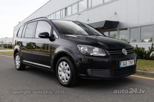 Black Volkswagen Touran 2011 in Tallinn, with an engine capacity of 1.60 L and mileage of 351 thousand km for 4999 €, photo  on AUTOMOTO.COM.LV