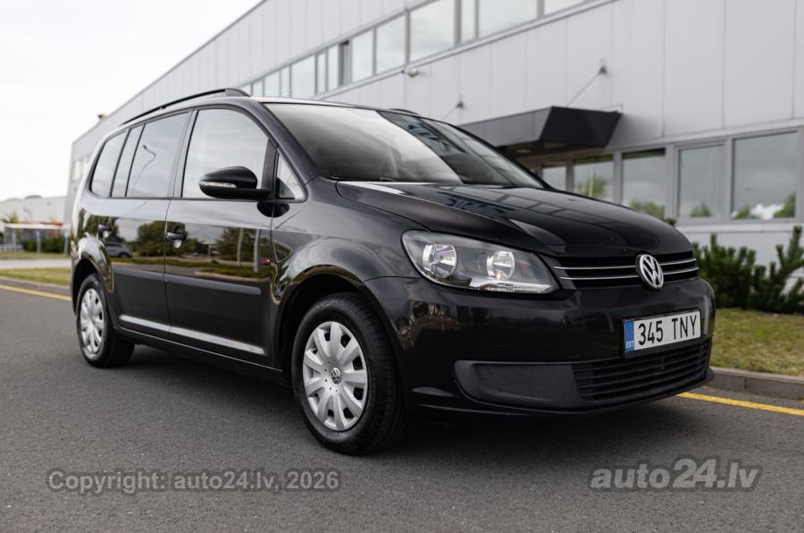 Black Volkswagen Touran 2011 in Tallinn, with an engine capacity of 1.60 L and mileage of 351 thousand km for 4999 €, photo 1 on AUTOMOTO.COM.LV
