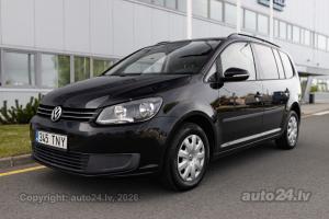 Black Volkswagen Touran 2011 in Tallinn, with an engine capacity of 1.60 L and mileage of 351 thousand km for 4999 €, photo 3 on AUTOMOTO.COM.LV