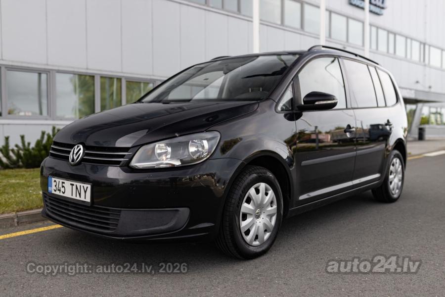 Black Volkswagen Touran 2011 in Tallinn, with an engine capacity of 1.60 L and mileage of 351 thousand km for 4999 €, photo 3 on AUTOMOTO.COM.LV