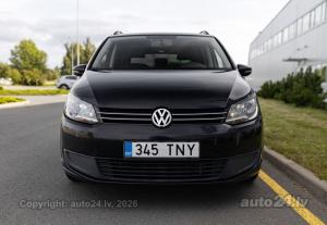 Black Volkswagen Touran 2011 in Tallinn, with an engine capacity of 1.60 L and mileage of 351 thousand km for 4999 €, photo 4 on AUTOMOTO.COM.LV